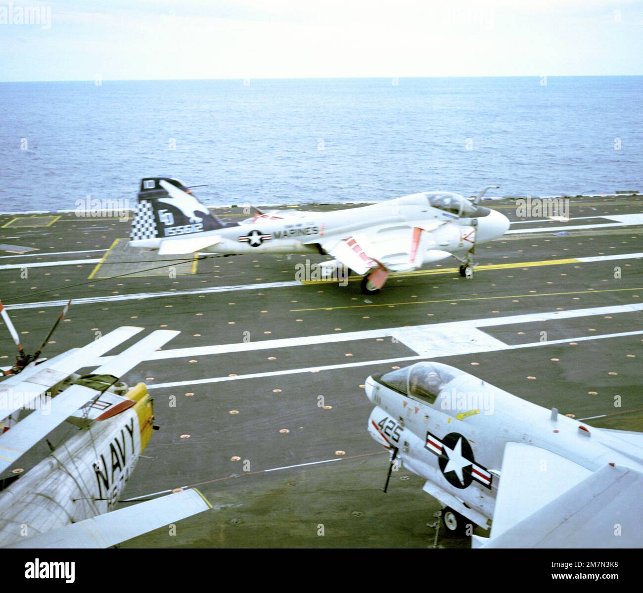 Right side view of a Marine A-6E Intruder aircraft landing on the ...