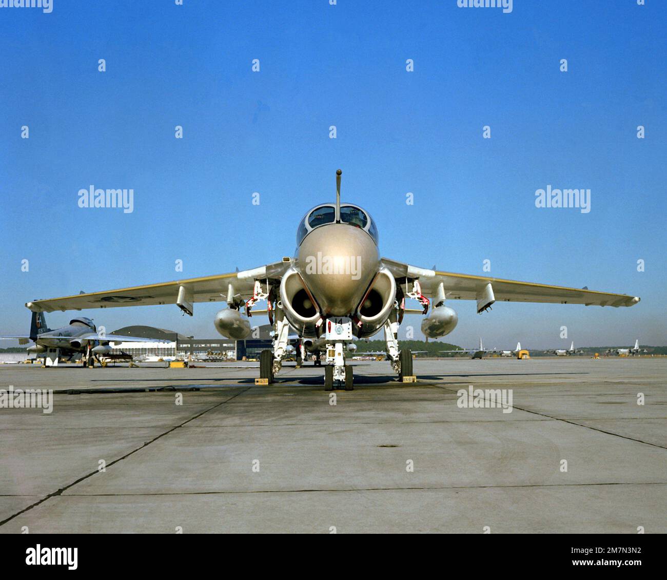 A front view of a Marine A-6E Intruder aircraft sitting on the flight ...