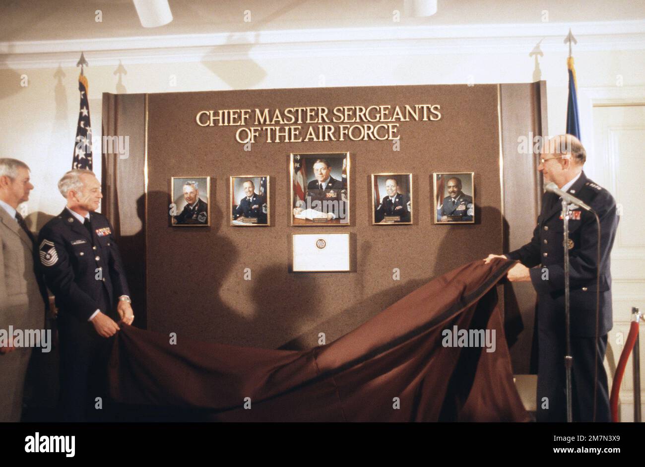 General Lew Allen Jr. unveils a plaque honoring the present and former ...