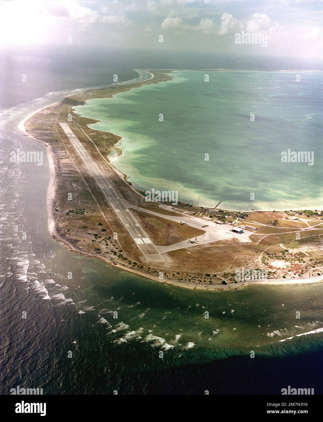 An aerial view of the runway and flight line facilities on Phoenix ...