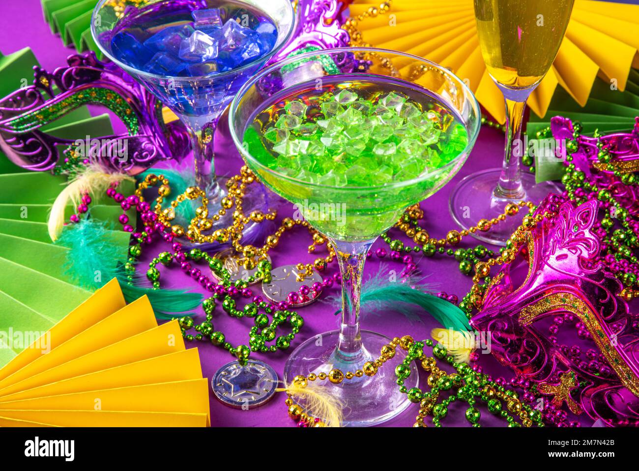 Mardi gras cocktails set. Colorful purple, yellow, green martini ...