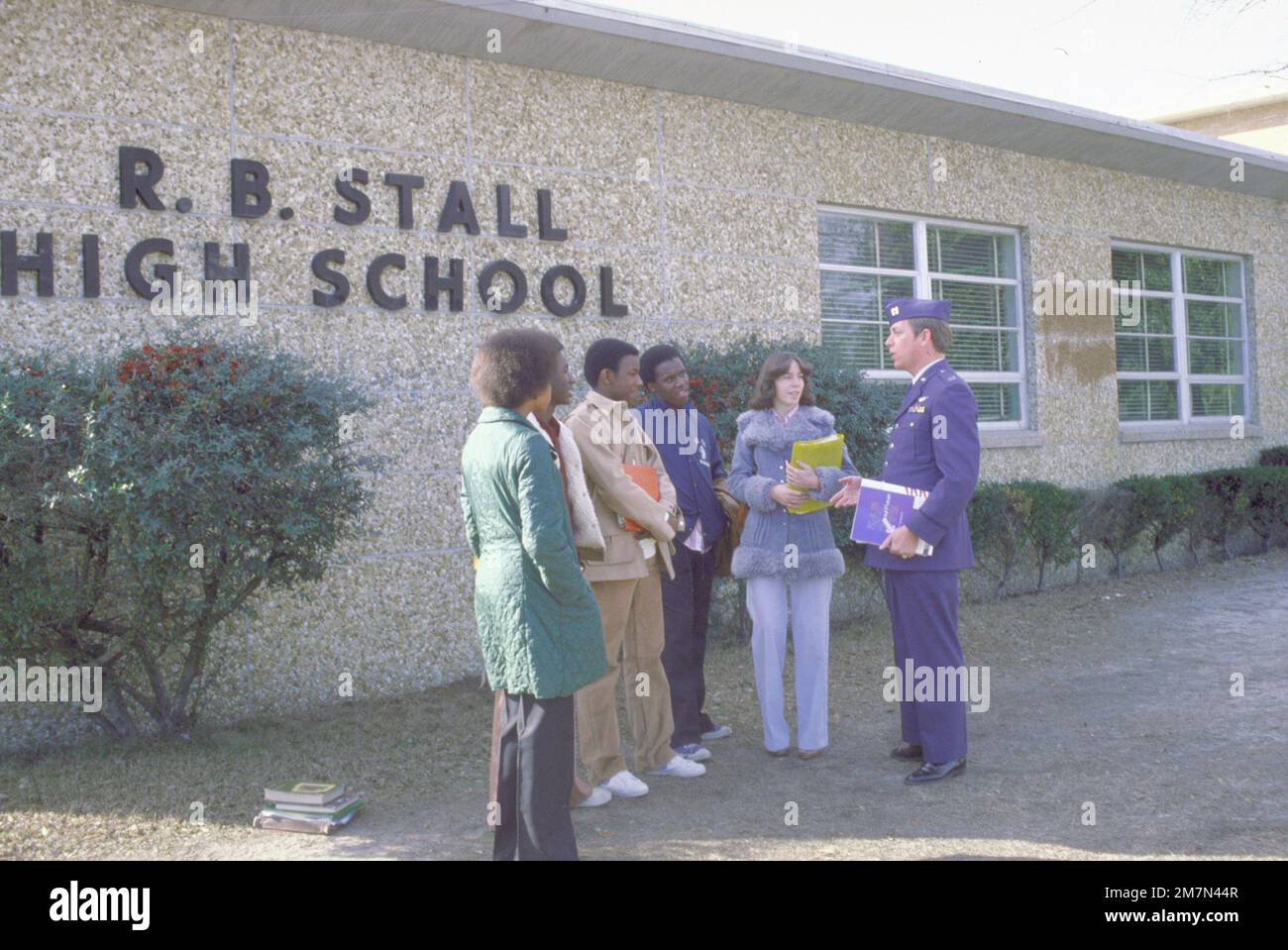 Air Force Academy recruiter Captain John Mack talks with students of R ...