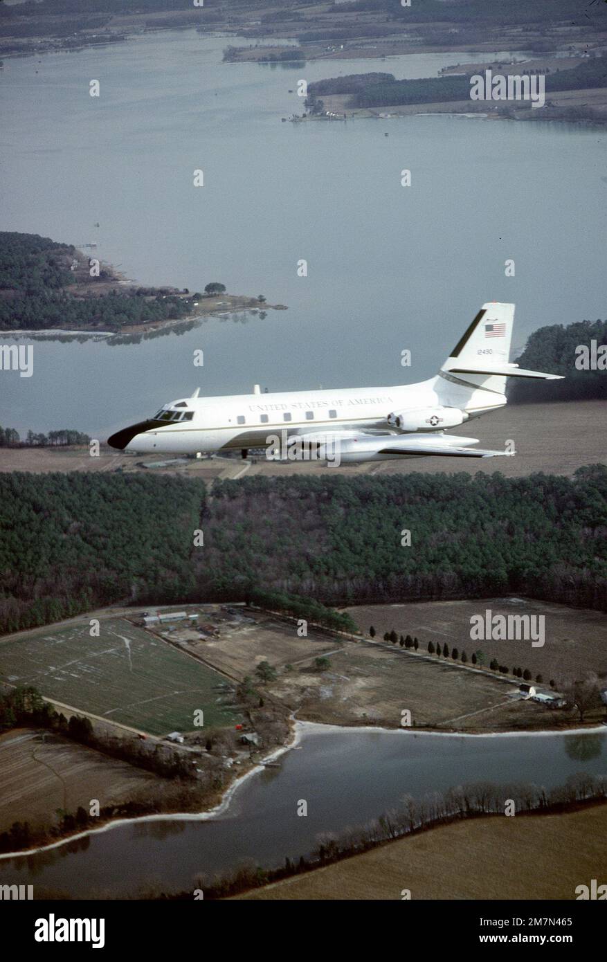 An air-to-air left side view of an 89th Military Airlift Wing C-140B ...