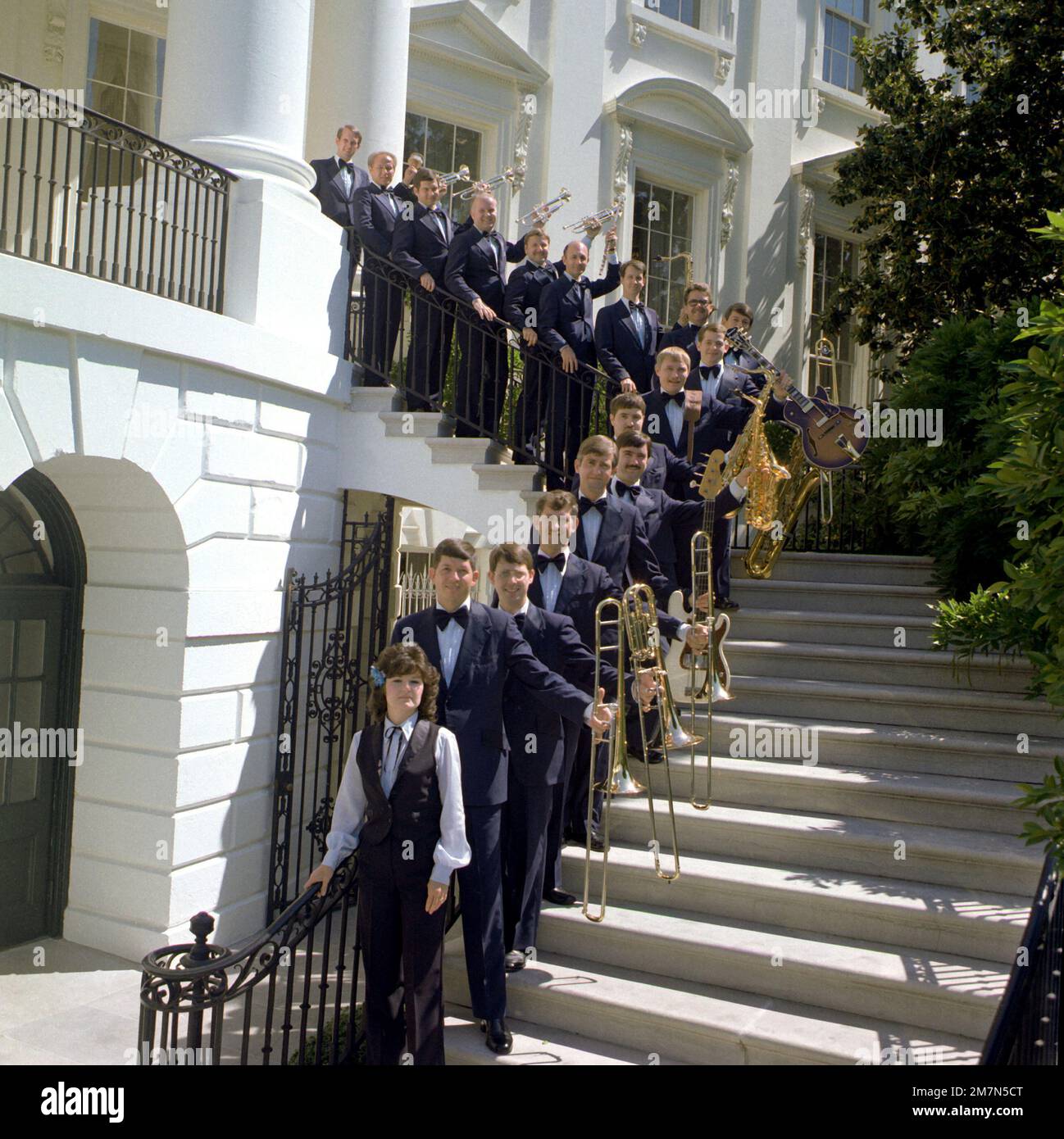 The U.S. Air Force Band, in formal dress uniform, poses on the steps of ...