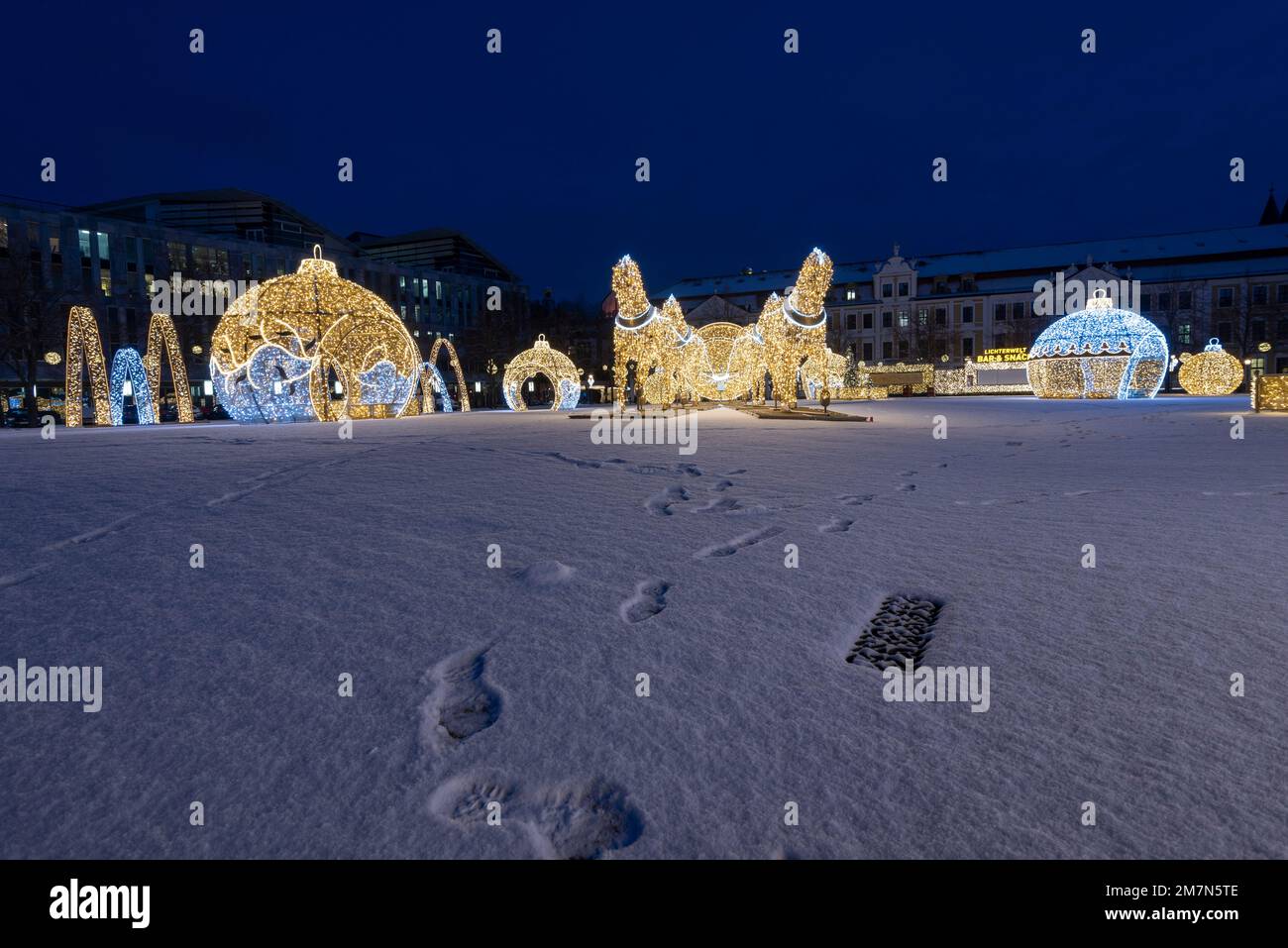 Snow-covered cathedral square, glowing horse sculptures, glowing ...