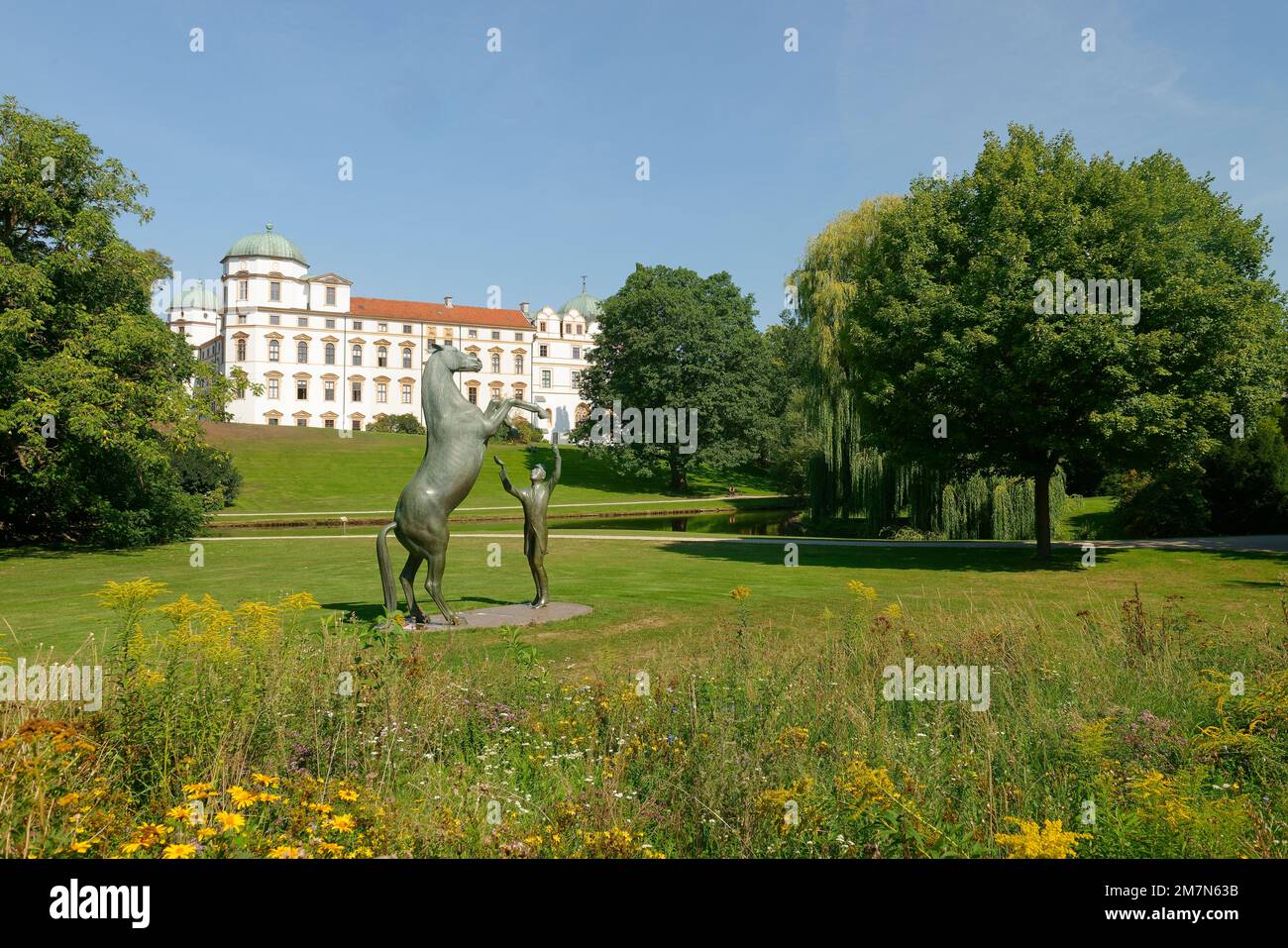 View of the castle park with the sculpture Stallion Euphony and the ...