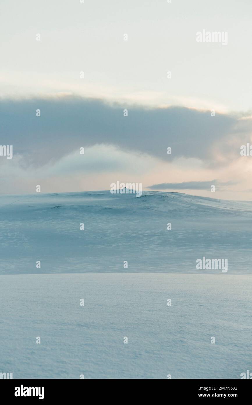Snowy landscape with snow covered mountains in Norway, snow desert at ...