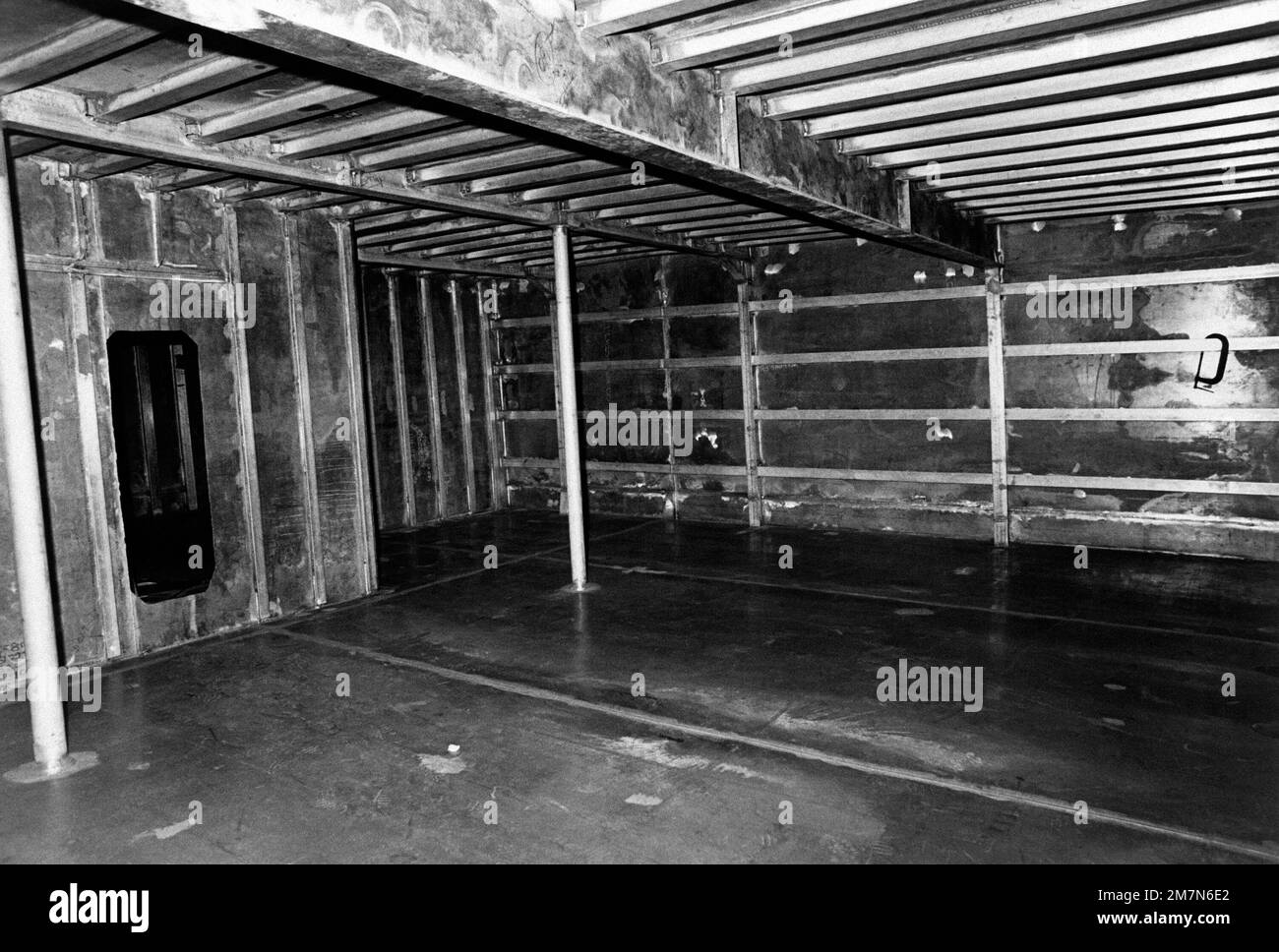 An interior view of the combat information center of the guided missile ...