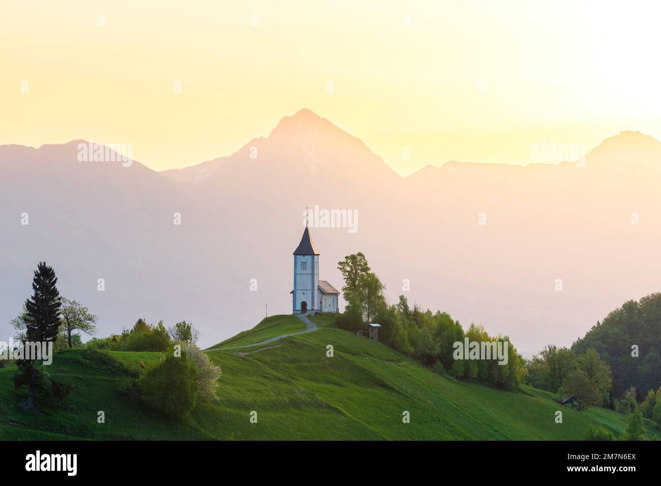 The iconic Jamik church, with Mount Triglav on the background at ...