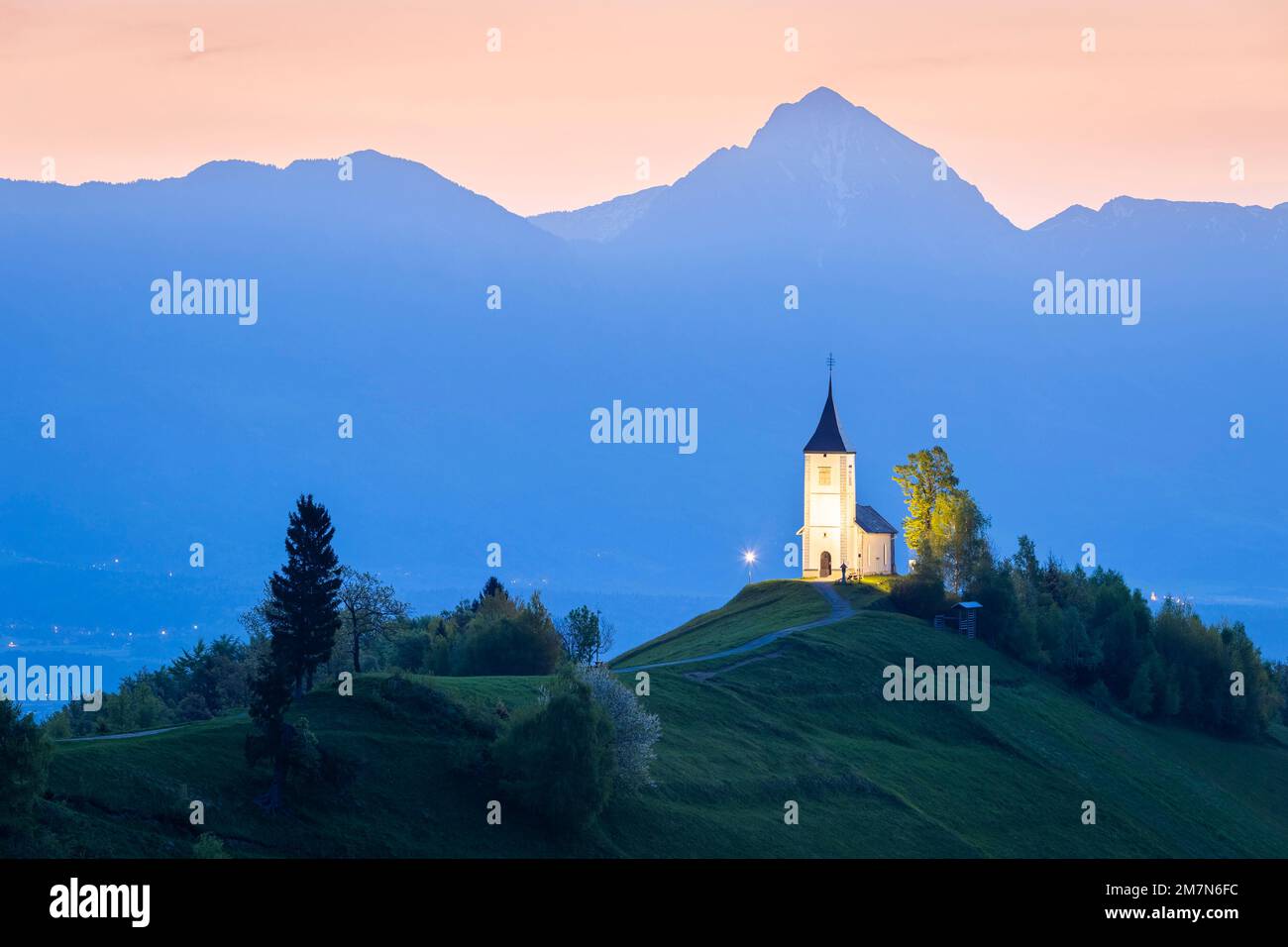 The iconic Jamik church, with Mount Triglav on the background ...