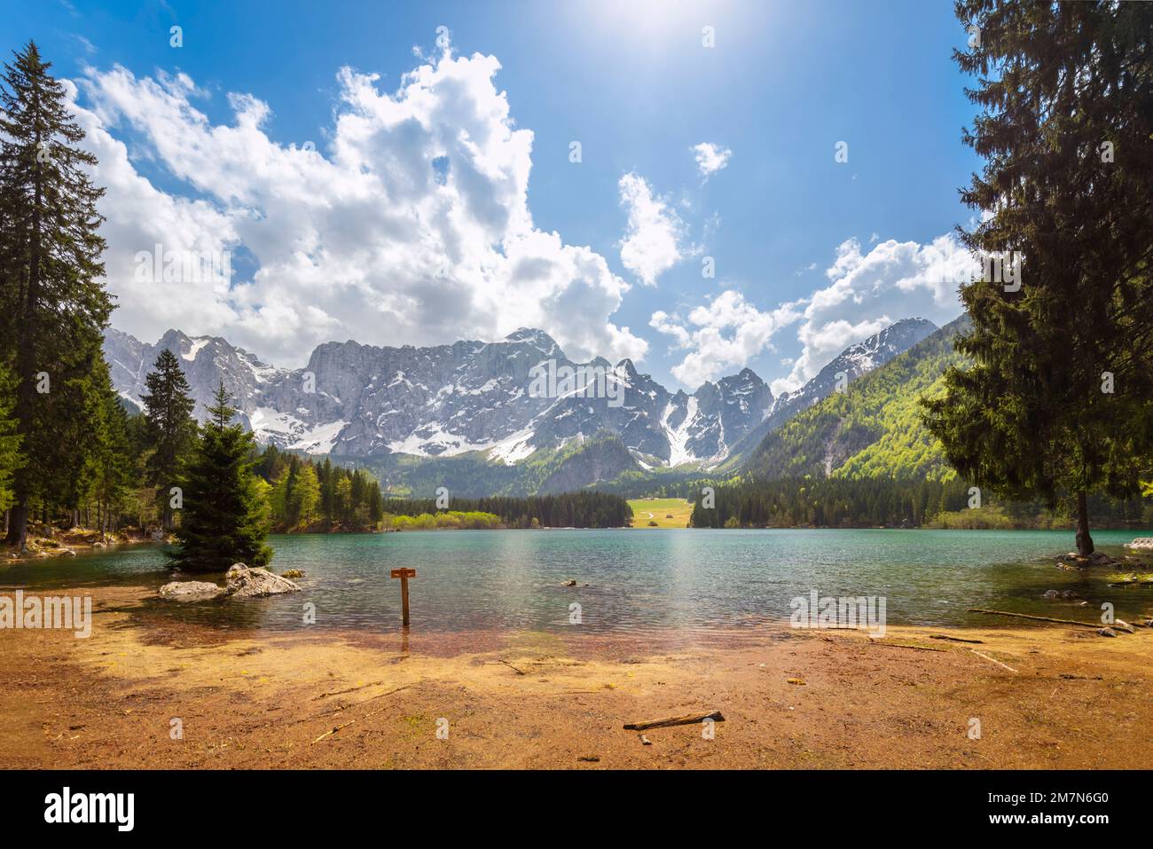 Aerial view of the superior Fusine Lake with Mount Mangart on the ...
