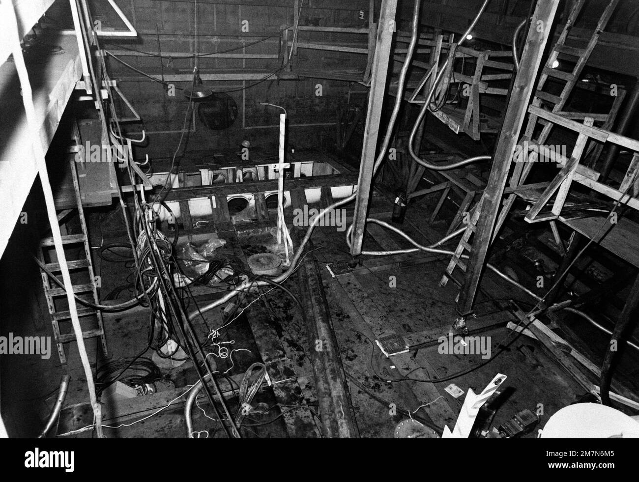 An interior view of the engine room on the guided missile frigate USS ...