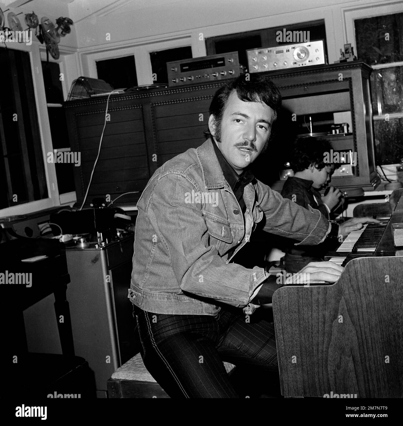Singer Bobby Darin is shown in his Beverly Hills, Calif. home, seated ...