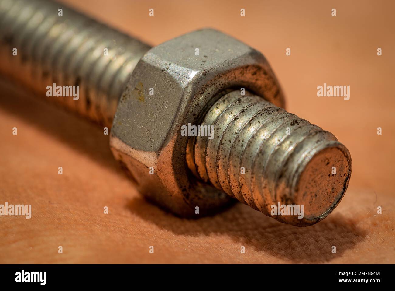 Bolt and screw nut detail macro close up shot Stock Photo - Alamy