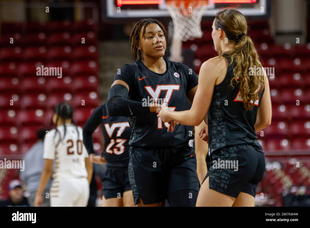 Virginia Tech forward Taylor Soule (13) celebrates with guard Cayla ...