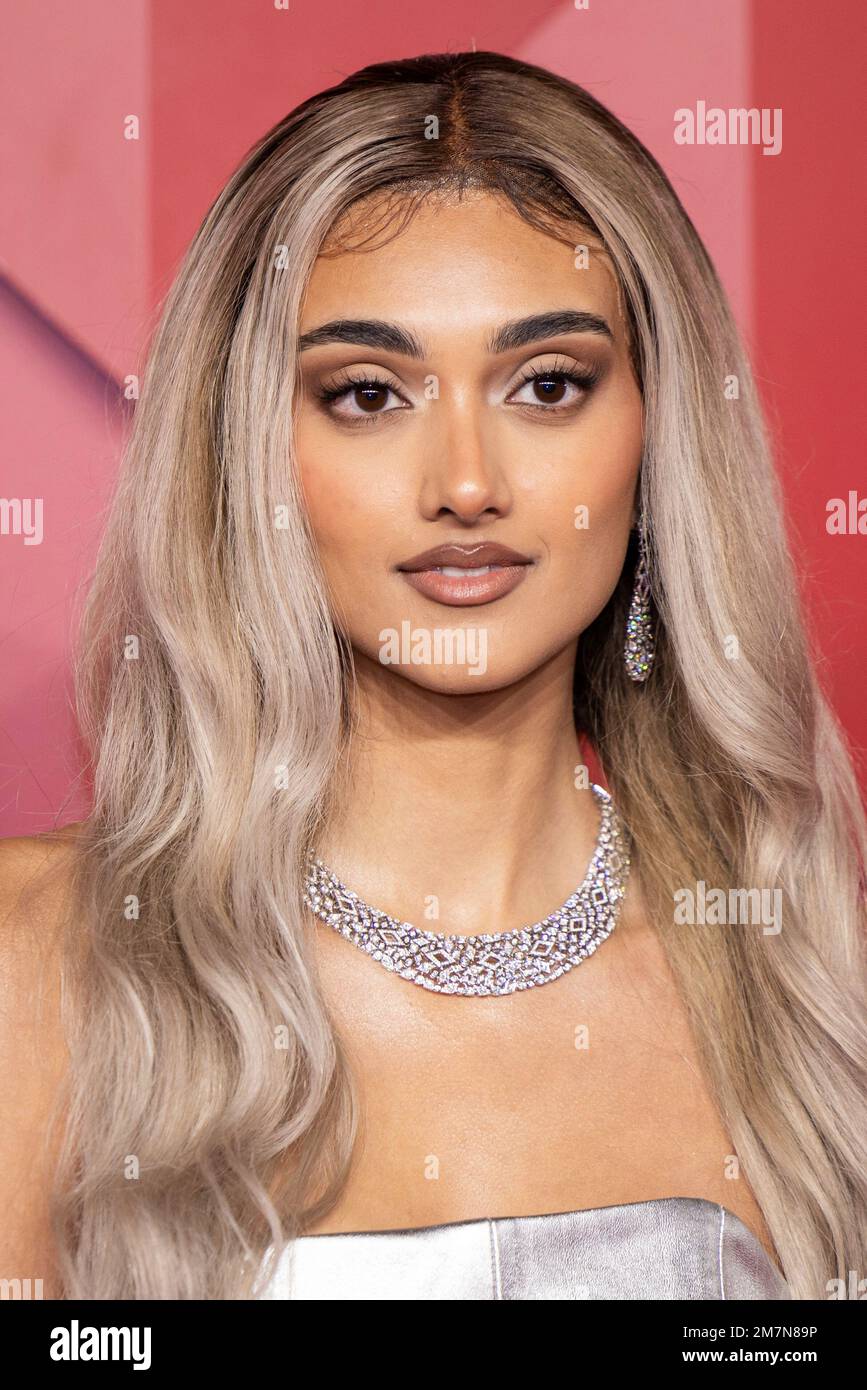 Neelam Gill poses for photographers upon arrival at the British Fashion ...