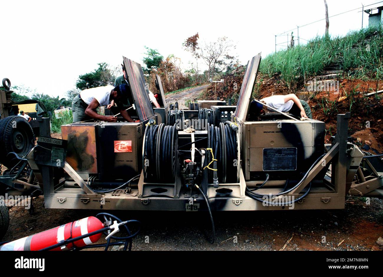 Members of the 507th Tactical Air Control Center work on power ...
