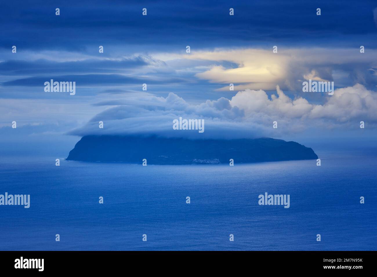 The tiny and imposing inhabited island of Corvo in the middle of the ...