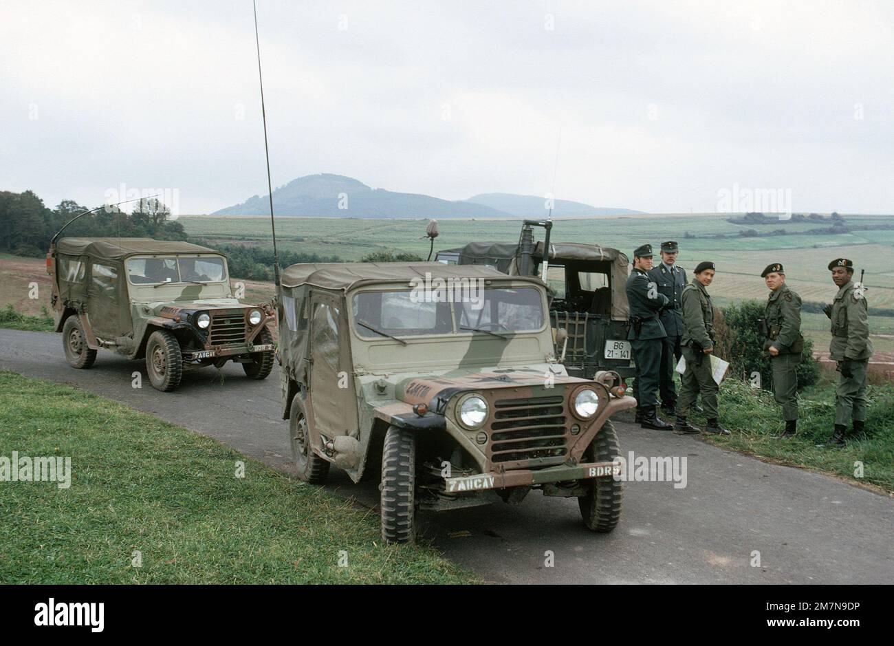 Members of the 11th Armored Cavalry stop to talk with West German ...