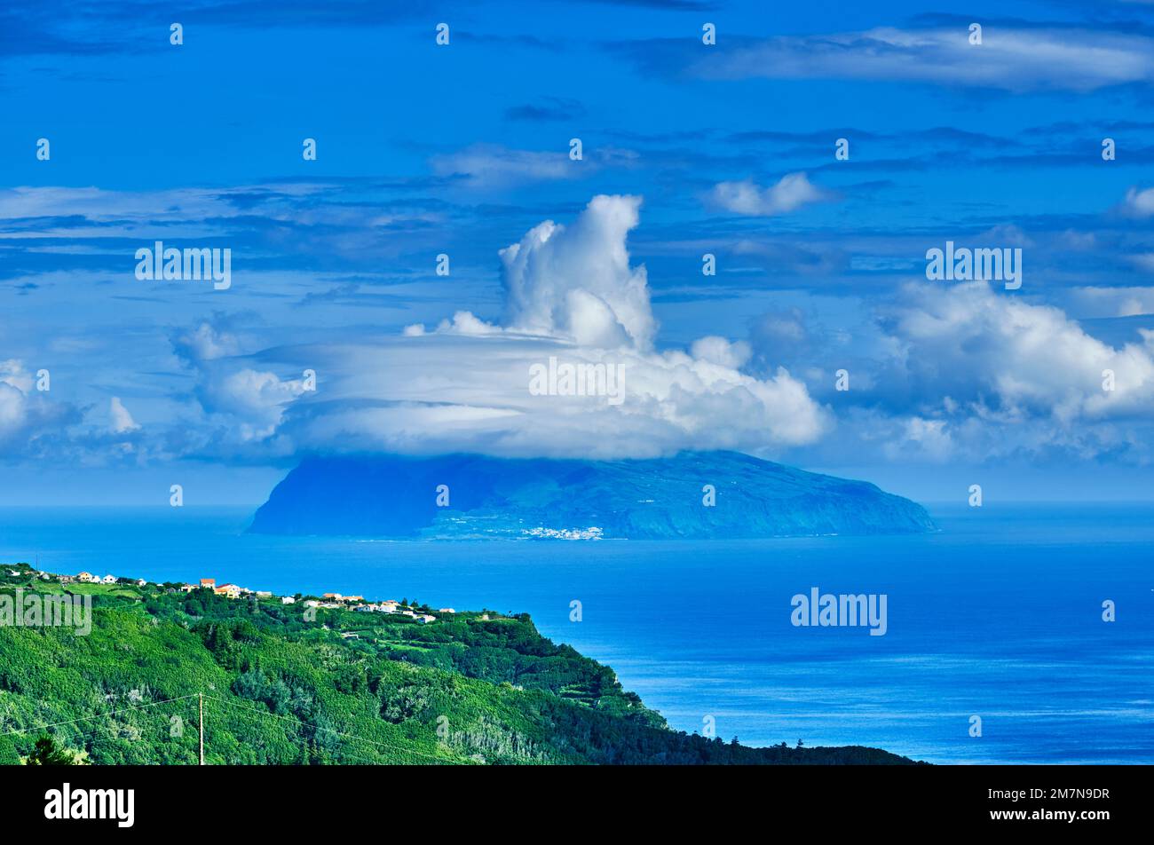 The tiny and imposing inhabited island of Corvo in the middle of the ...