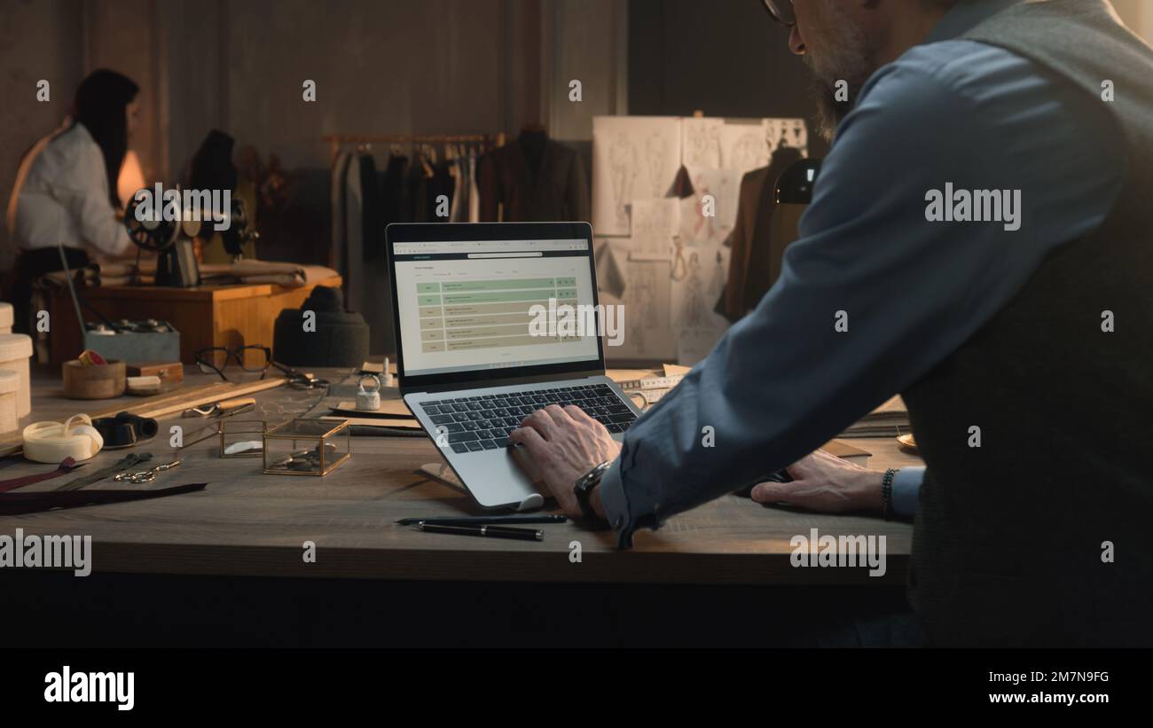 Bespoke clothing designer hi-res stock photography and images - Alamy