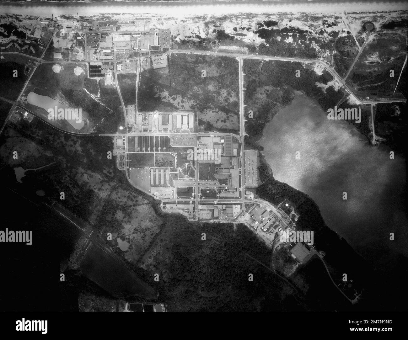 To base of neck Black and White Stock Photos & Images - Alamy