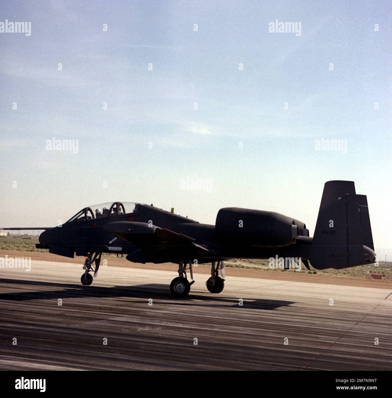Left side view of an A-10 Thunderbolt II aircraft landing on the runway ...