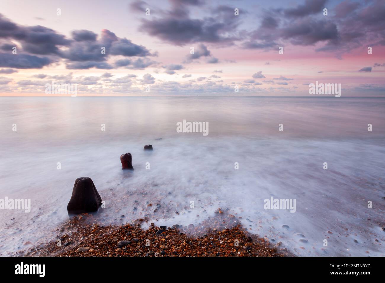 Sunrise on the beach in Southwick, West Sussex, England Stock Photo - Alamy