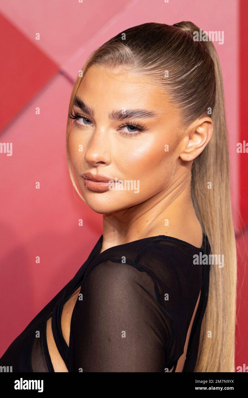 Jess Hunt poses for photographers upon arrival at the British Fashion ...