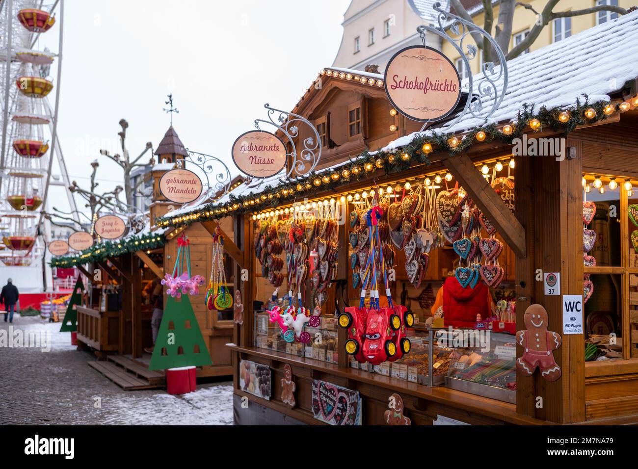 Stalls at a Christmas market with Christmas food and sweets on the day ...