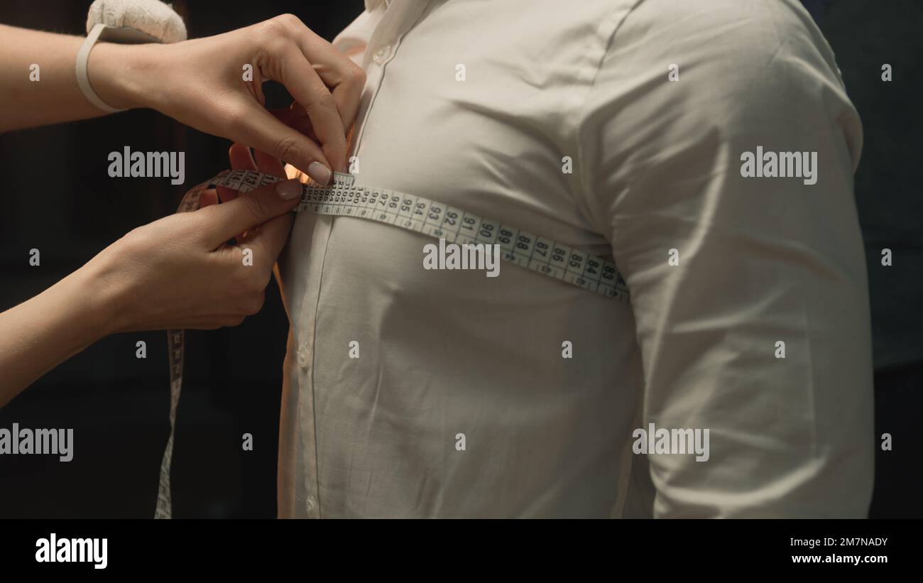 Tailor measure suit hi-res stock photography and images - Alamy