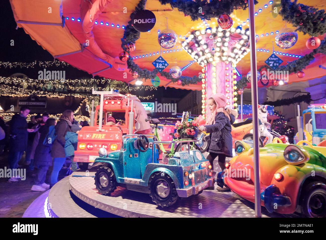 Children carousel at the Christmas market Stock Photo - Alamy