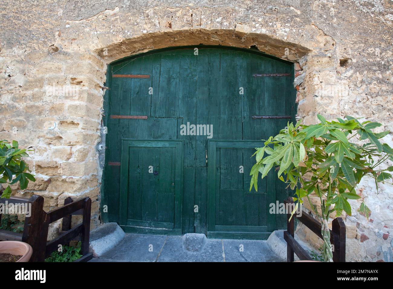 Big wooden gate in massive wall hi-res stock photography and images - Alamy