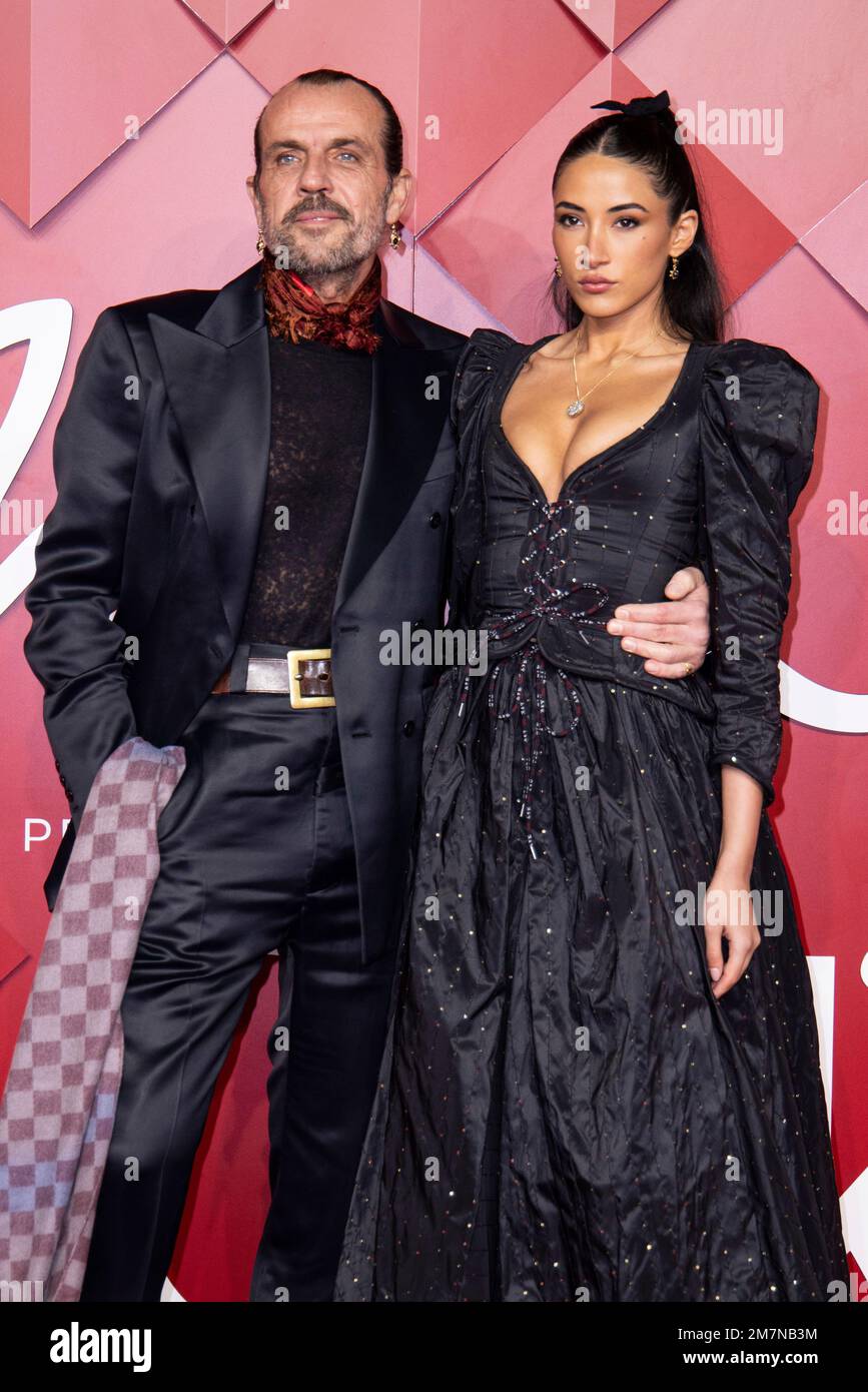 Andreas Kronthaler and Cora Corre pose for photographers upon arrival ...