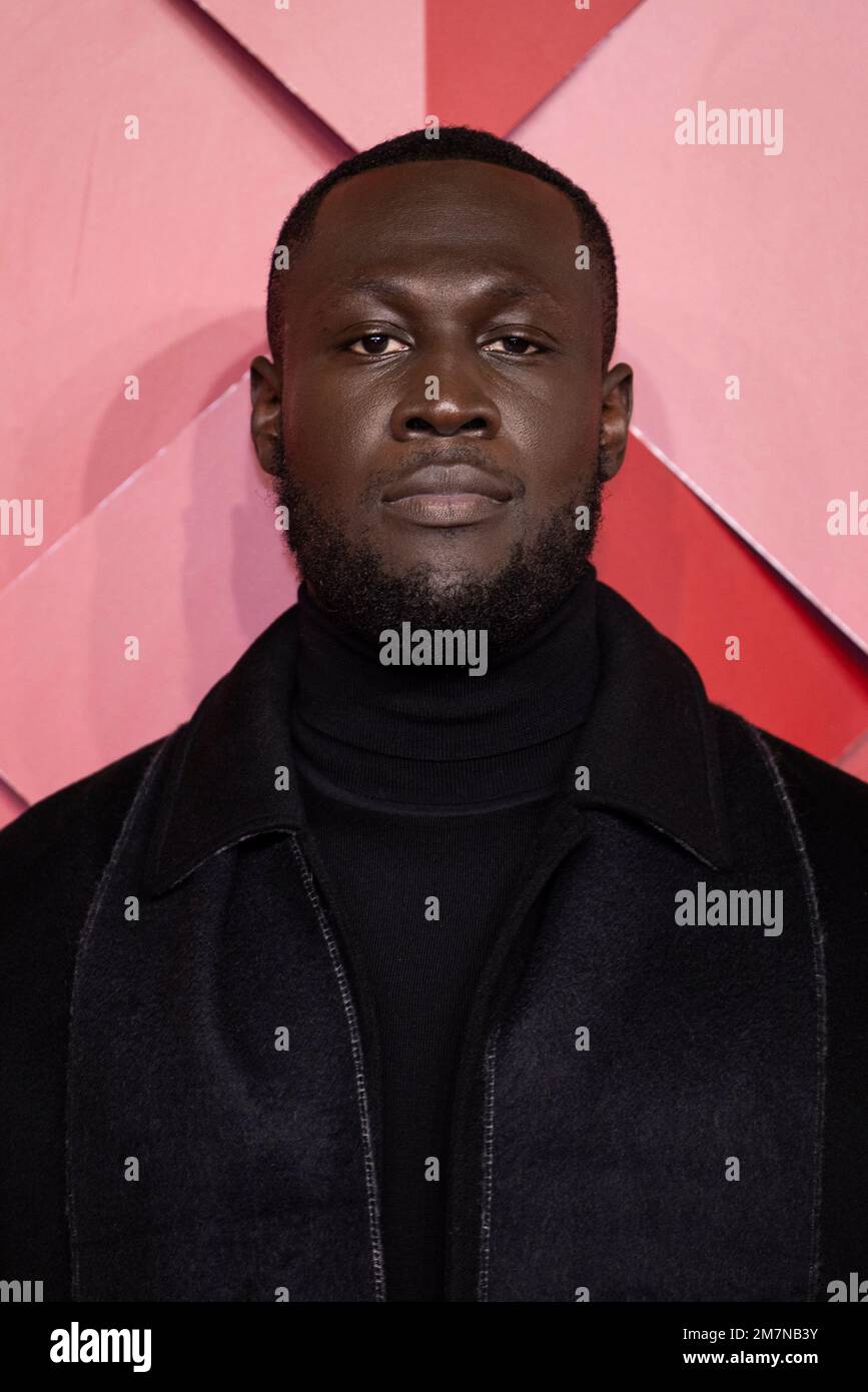 Michael Ebenezer Kwadjo Omari Owuo Jr., known professionally as Stormzy, poses for photographers ...