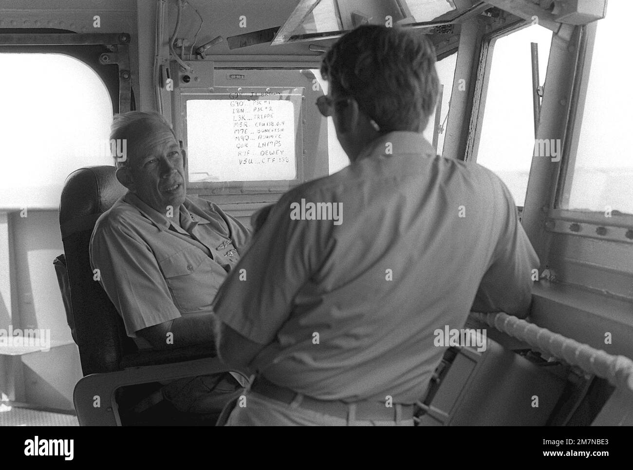 RADM John Ekelund, commander of exercise Unitas XX, talks with a ...