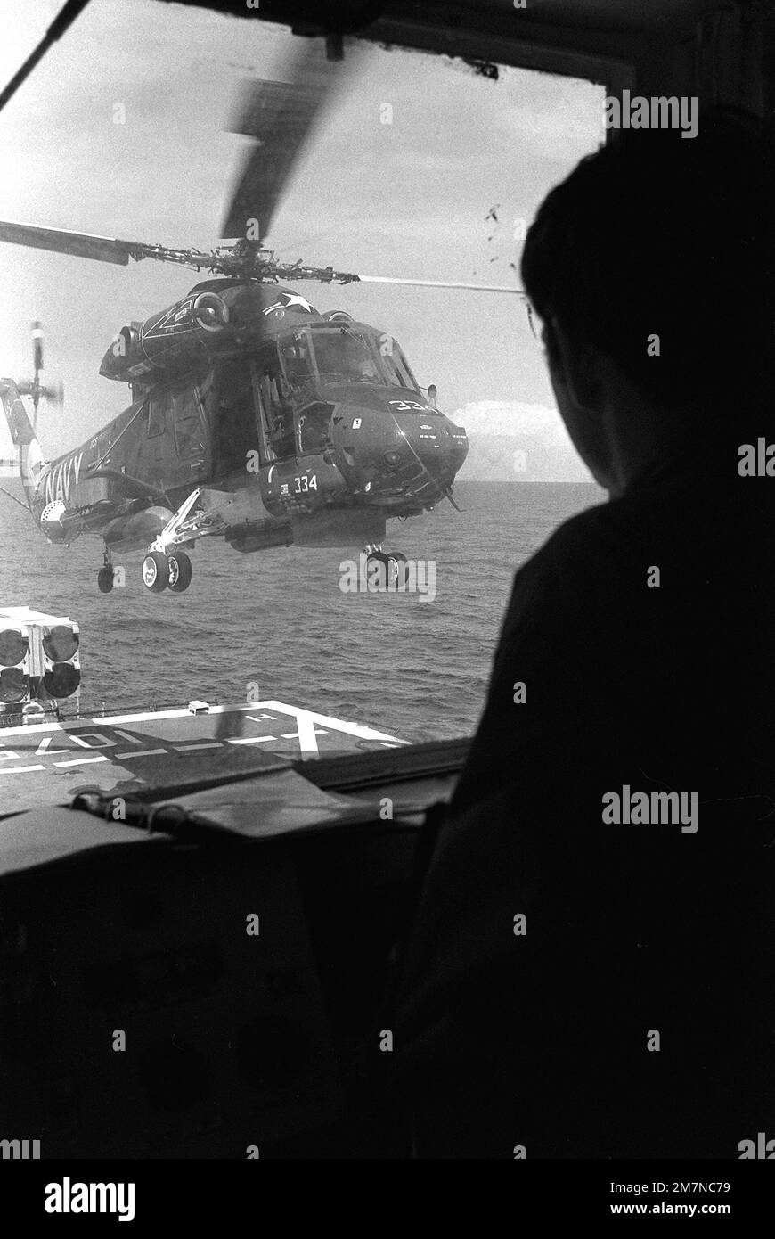 A view from the hangar of the frigate USS TRIPPE (FF-1075) of an SH-2 ...