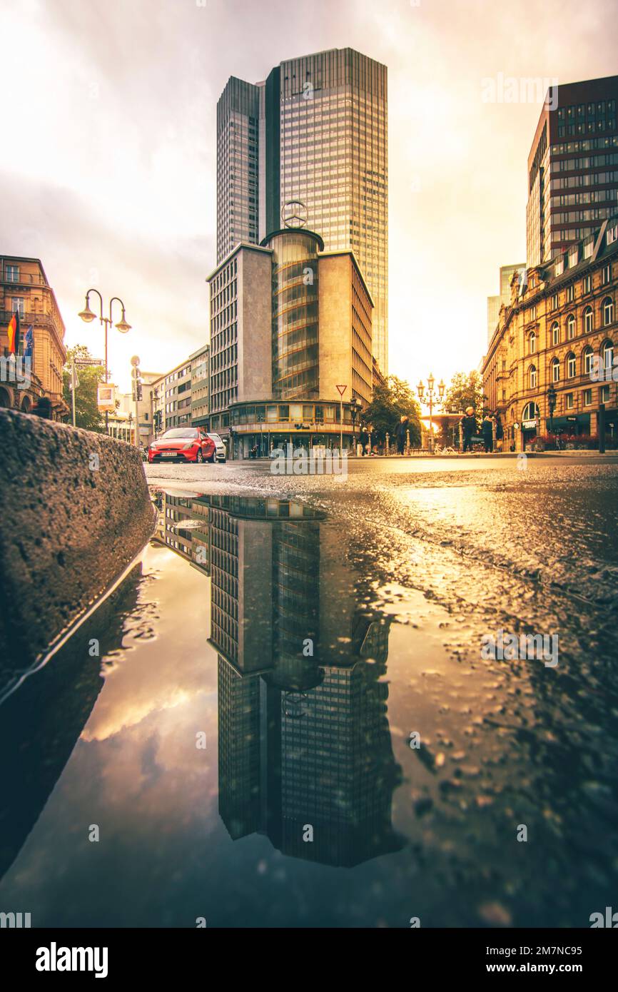 View into a street canyon in the morning. With sunlight and reflection ...
