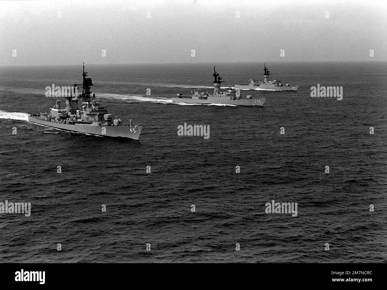 An aerial starboard bow view of exercise Unitas XX task force underway ...