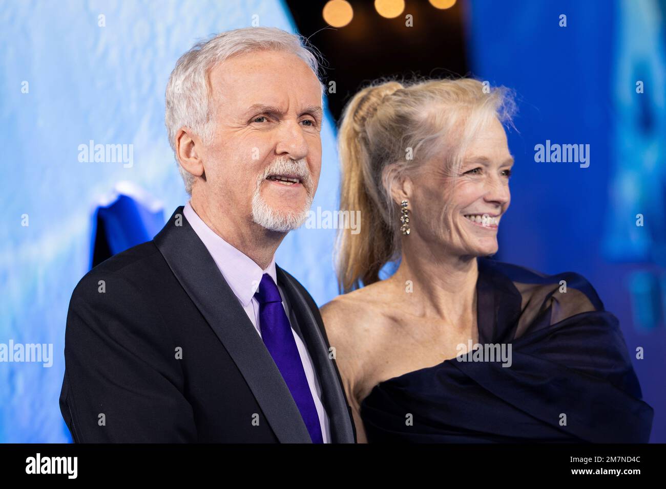 James Cameron and Suzy Amis Cameron pose for photographers upon arrival ...