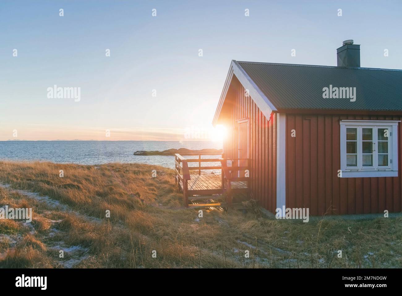 Traditional rorbu cabin / house in Lofoten at sunset, with terrace ...