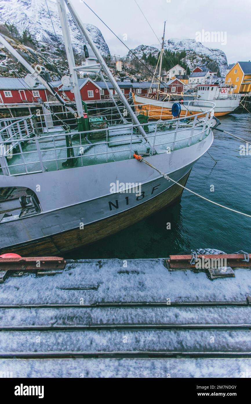 Fishing boat in harbor, Nusfjord, fishing village, Lofoten, Nordland ...