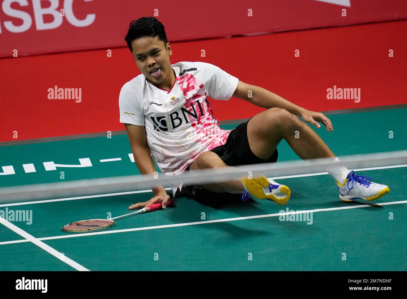 Indonesia's Anthony Sinisuka Ginting react after miss the shot from Indonesia's Jonatan Christie ...