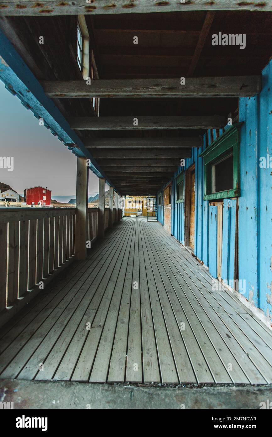 Covered jetty at harbor, Nyksund fishing village in Vesteralen, fishing ...