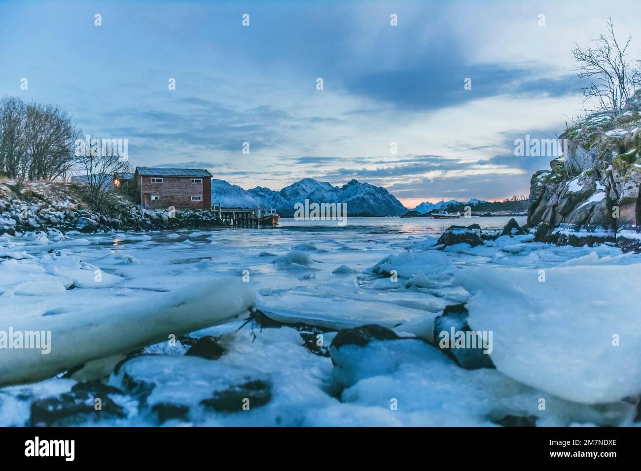Small old harbor in fjord in North Norge, Norway, frozen and icy ...