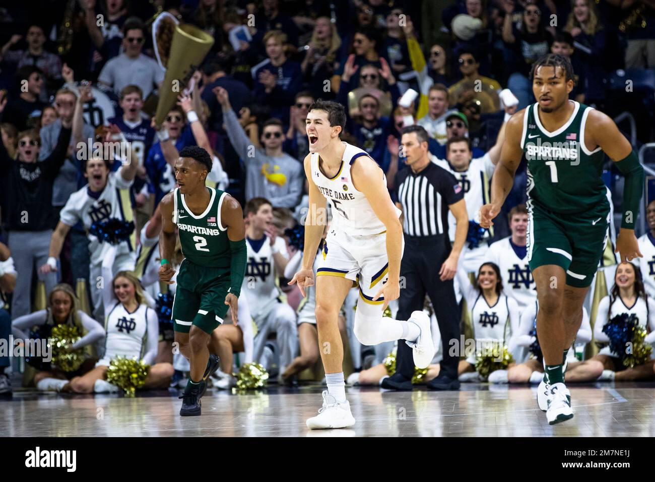 Notre Dame's Cormac Ryan (5) celebrates as Michigan State's Pierre ...