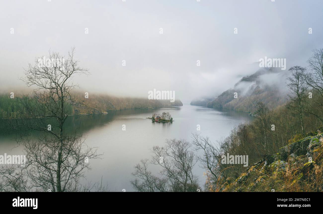 Island with lonely house in Norway, landscape with lonely houses ...