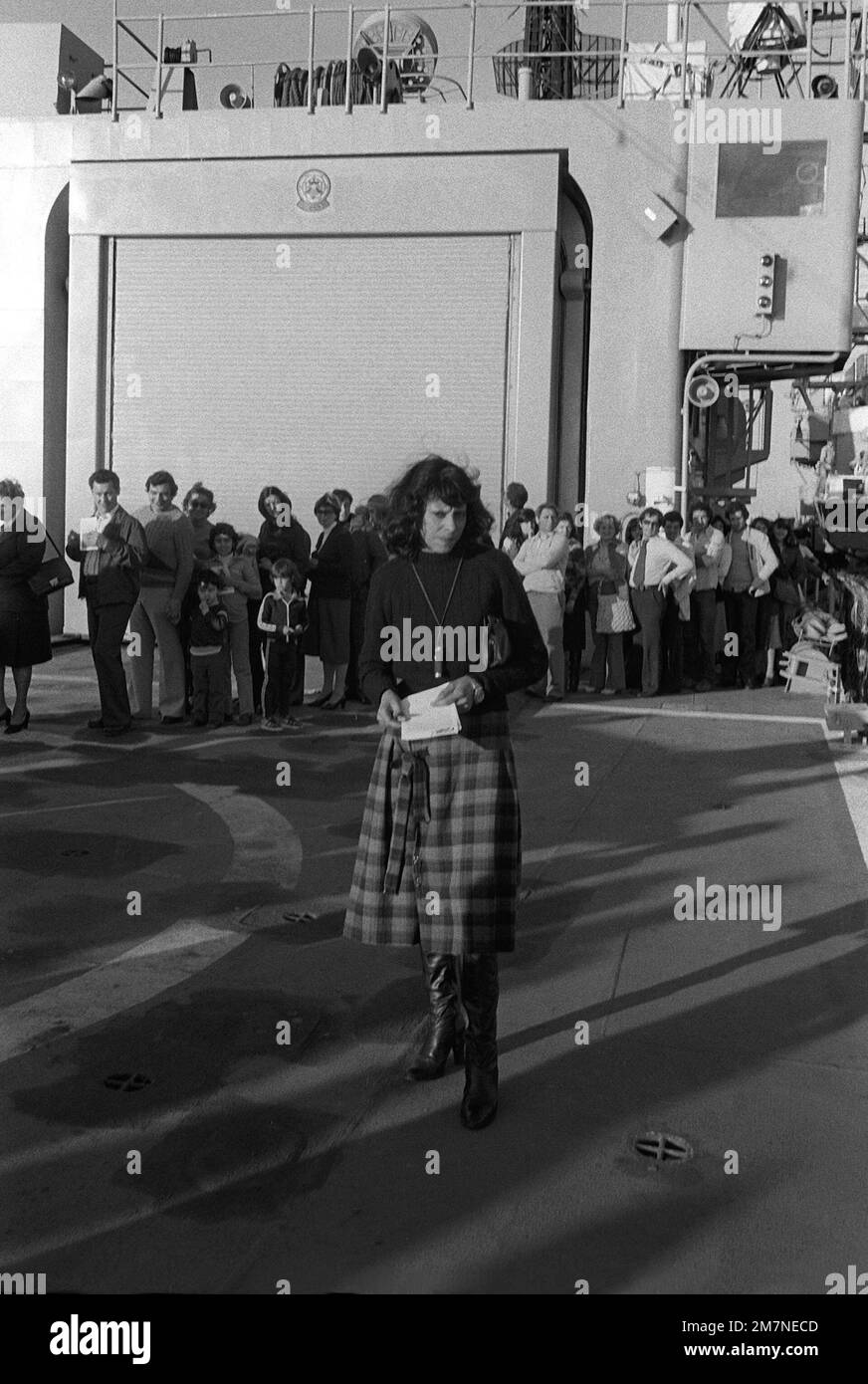 A local woman poses while touring one of the Unitas XX ships upon its ...