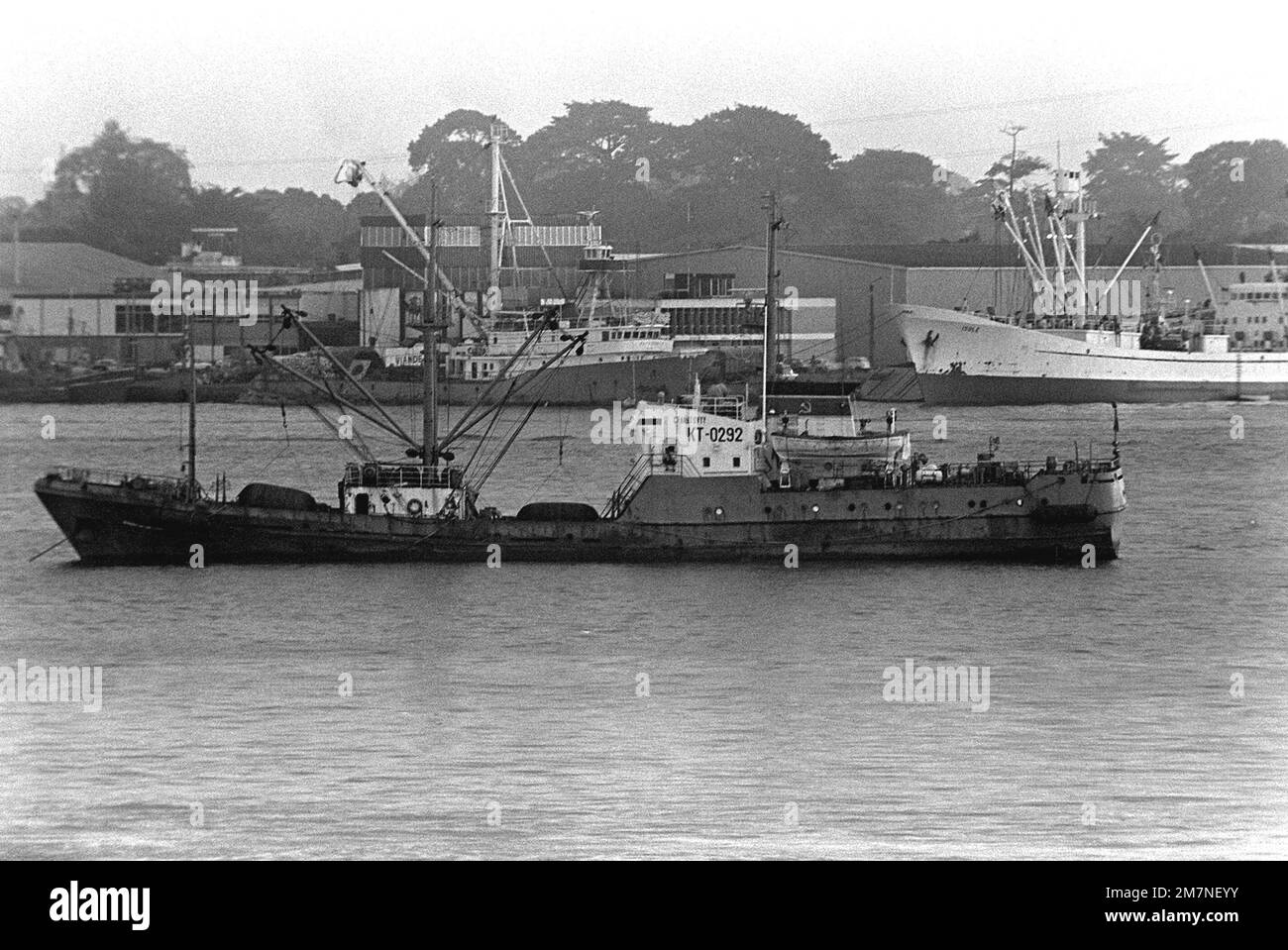 A port beam view of a Soviet trawler anchored offshore during exercise ...
