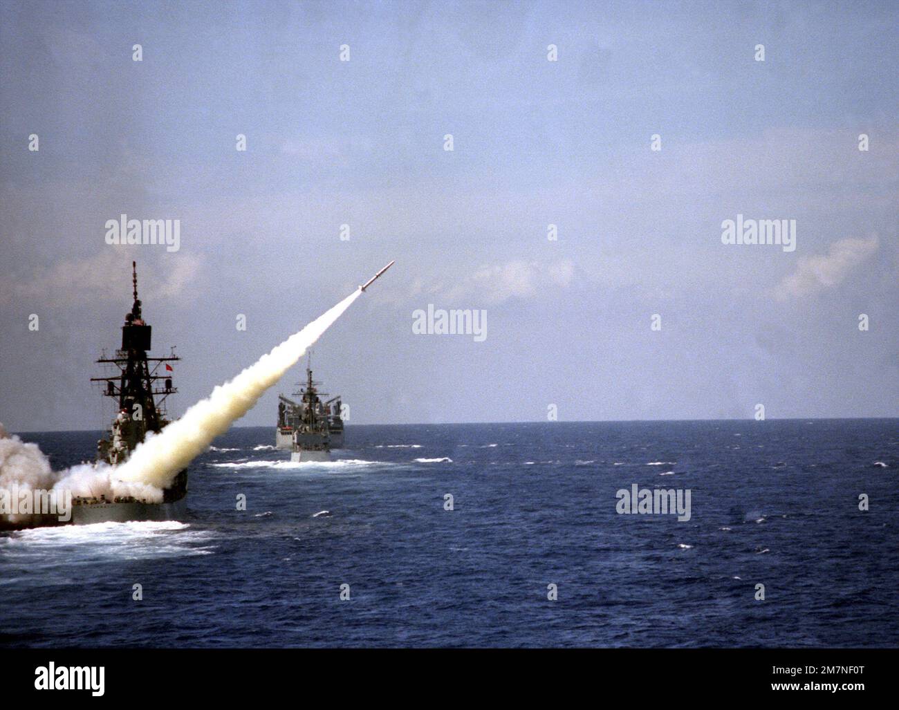 An RIM-2 Terrier surface-to-air missile is fired from the guided ...